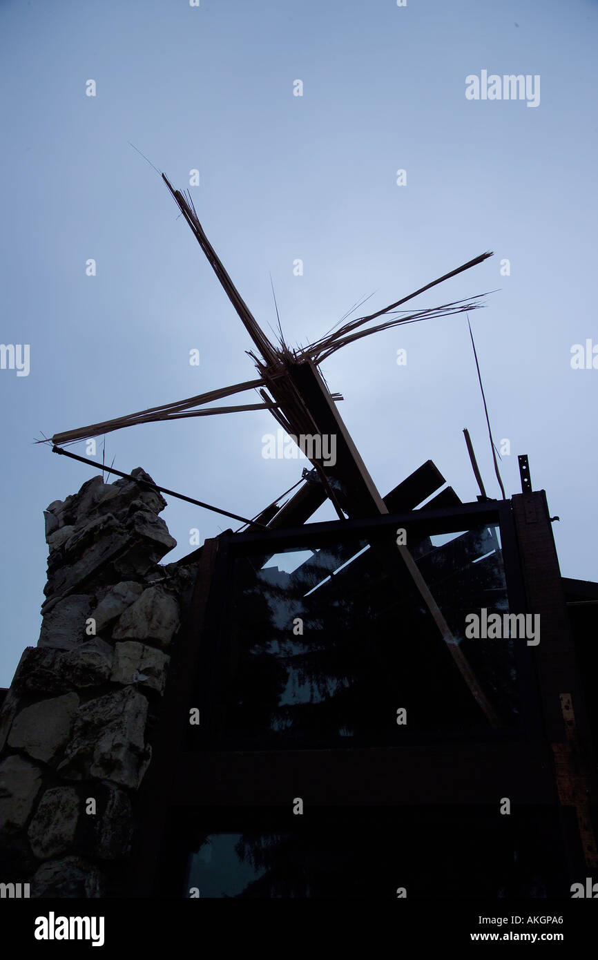demolished building with splintered frame in the shape of a cross Stock ...