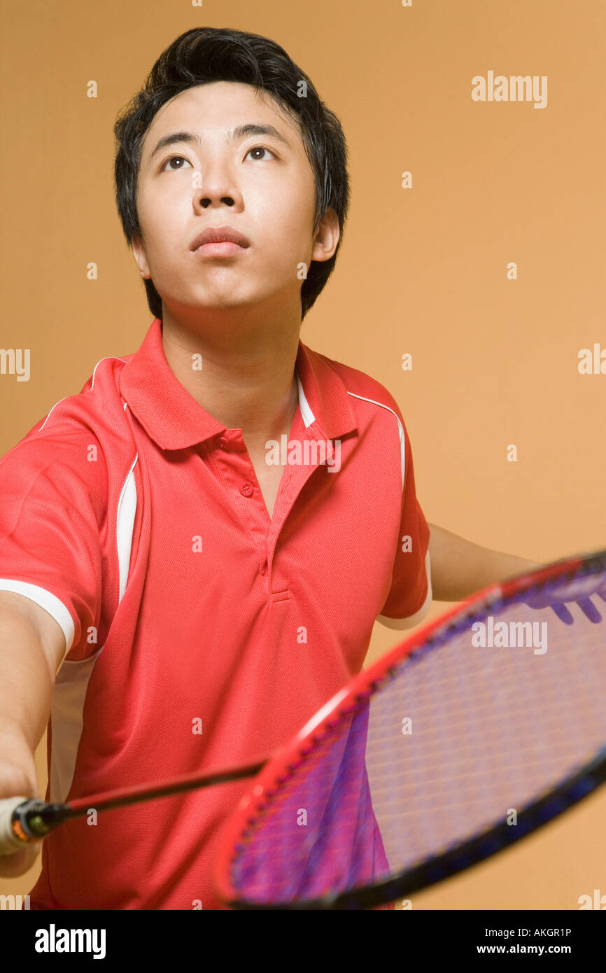 Close up young man playing badminton hi-res stock photography and ...