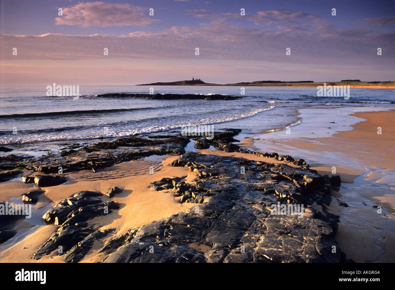 Dunstanburgh Castle and Embleton Bay, Northumberland, UK Stock Photo ...