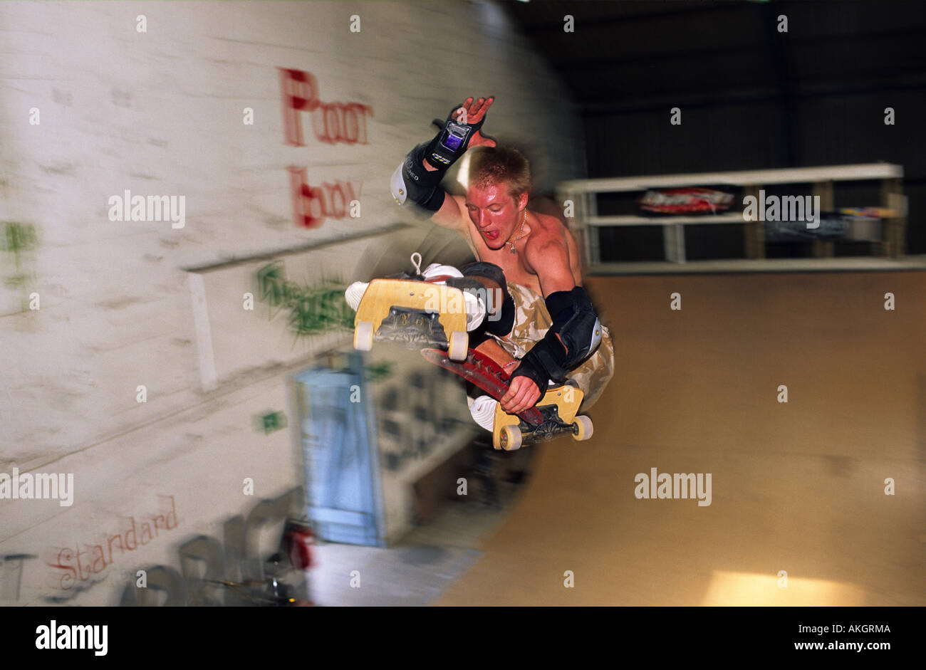 Snakeboarding in warehouse in Guernsey Stock Photo - Alamy