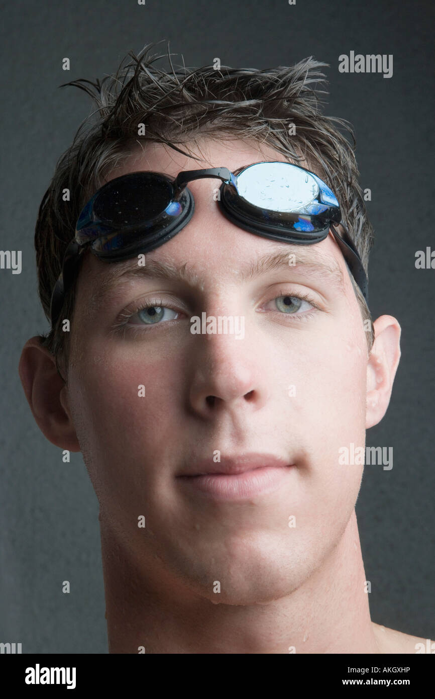 Close-up of a young man wearing swimming goggles Stock Photo - Alamy