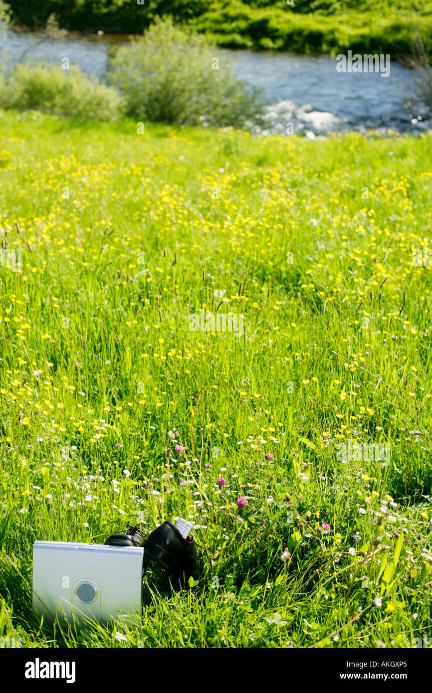 laptop in a spring field Stock Photo - Alamy