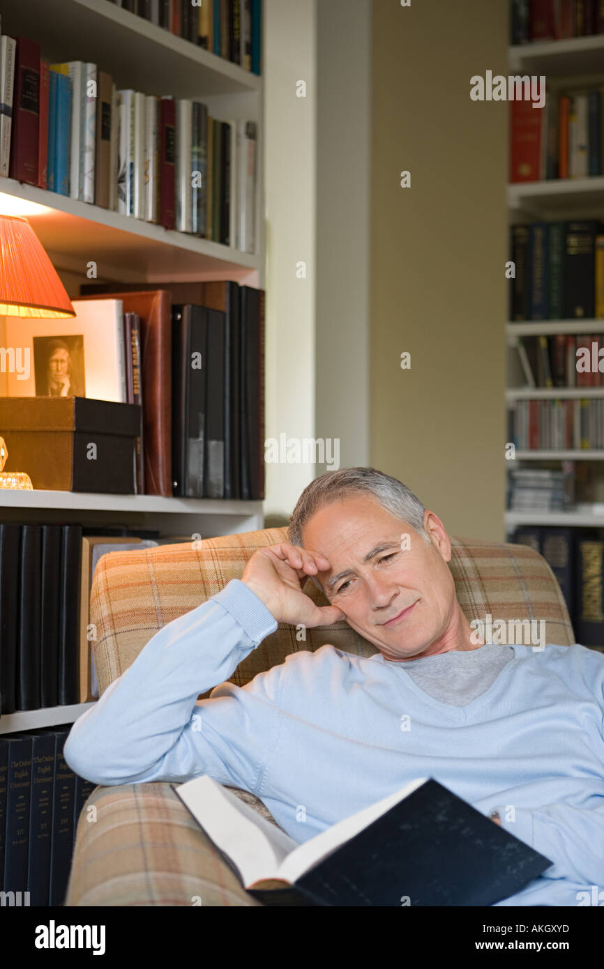 Man reading a book Stock Photo - Alamy