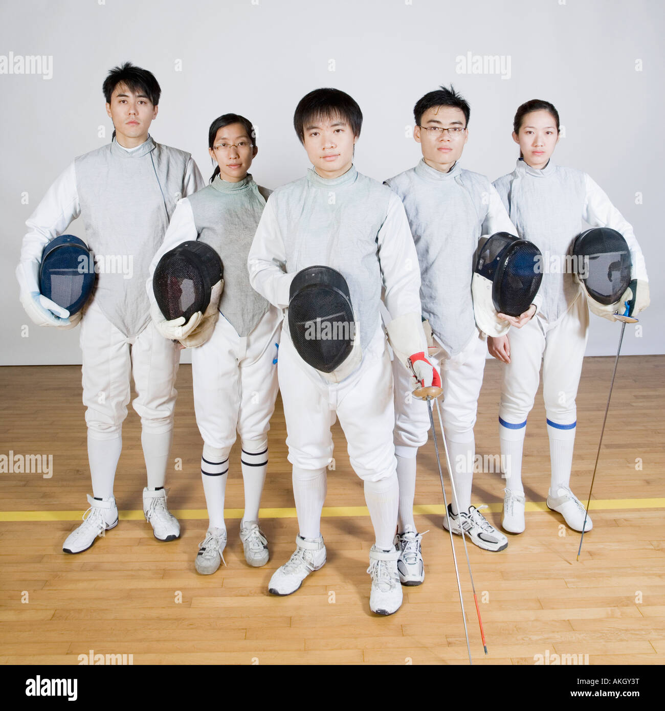 Portrait of five fencers standing together Stock Photo - Alamy