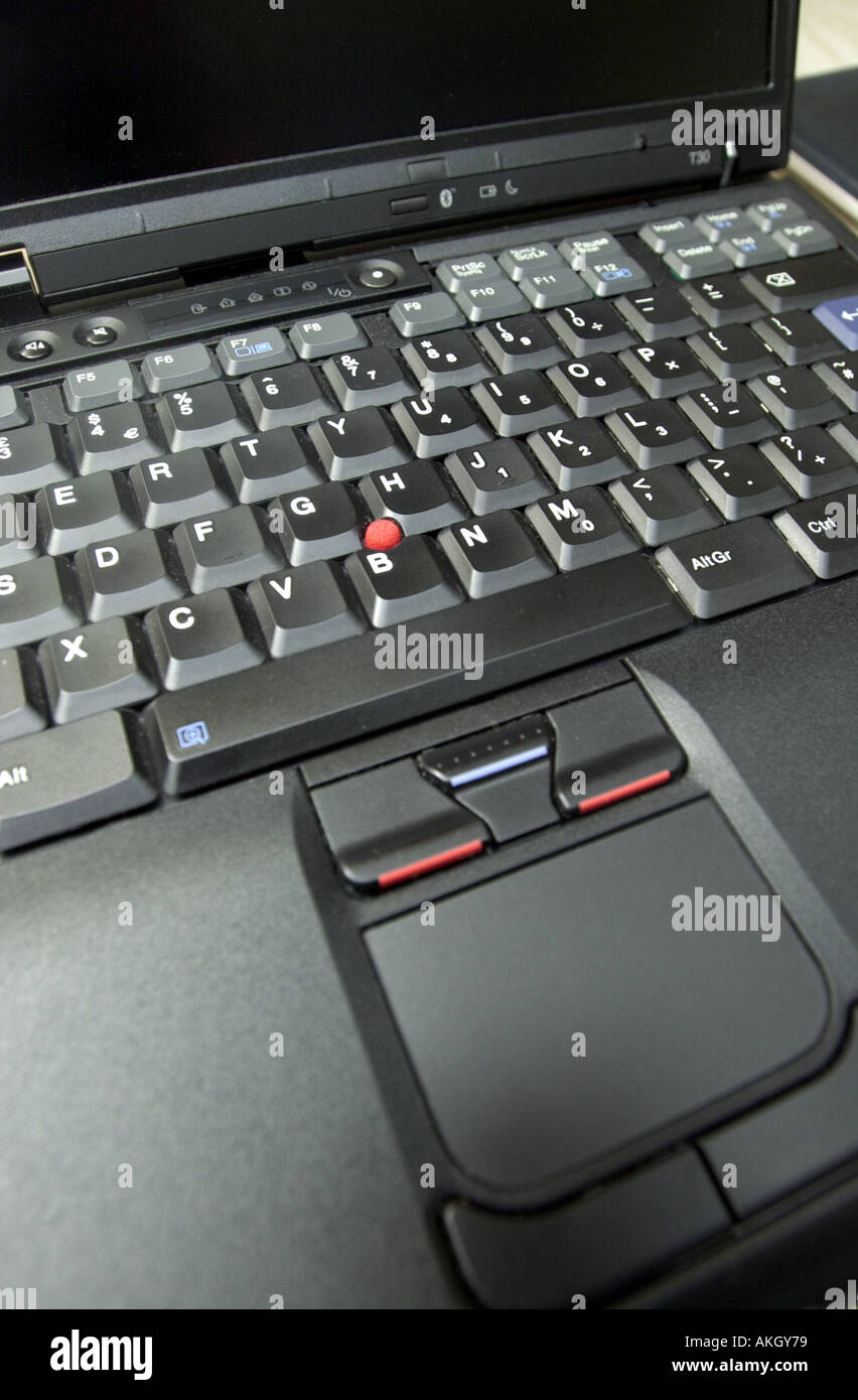 qwerty computer keyboard on a black laptop uk Stock Photo - Alamy