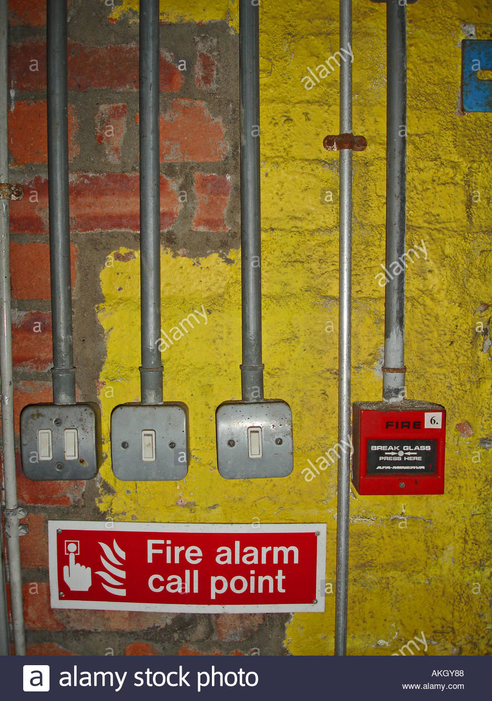 Electrical switches and fire alarm Stock Photo - Alamy
