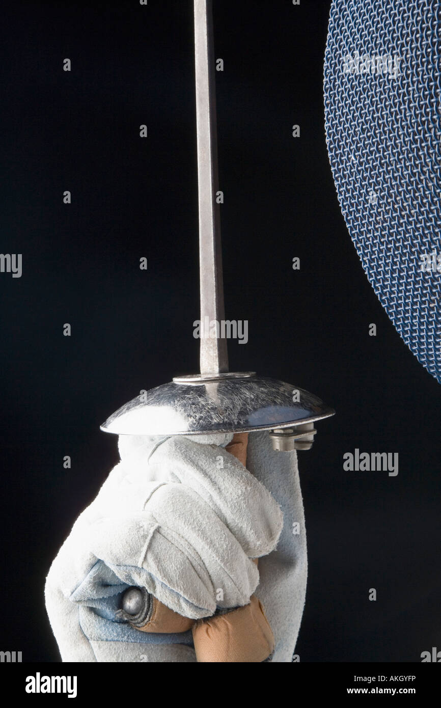 Close-up of a person's hand holding a fencing foil Stock Photo - Alamy