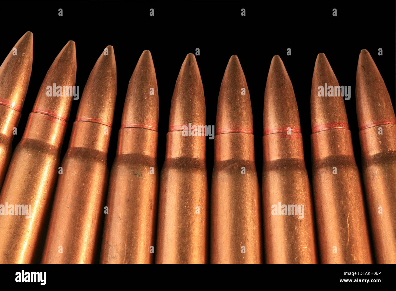 Brass rifle shells isolated on black background Stock Photo - Alamy