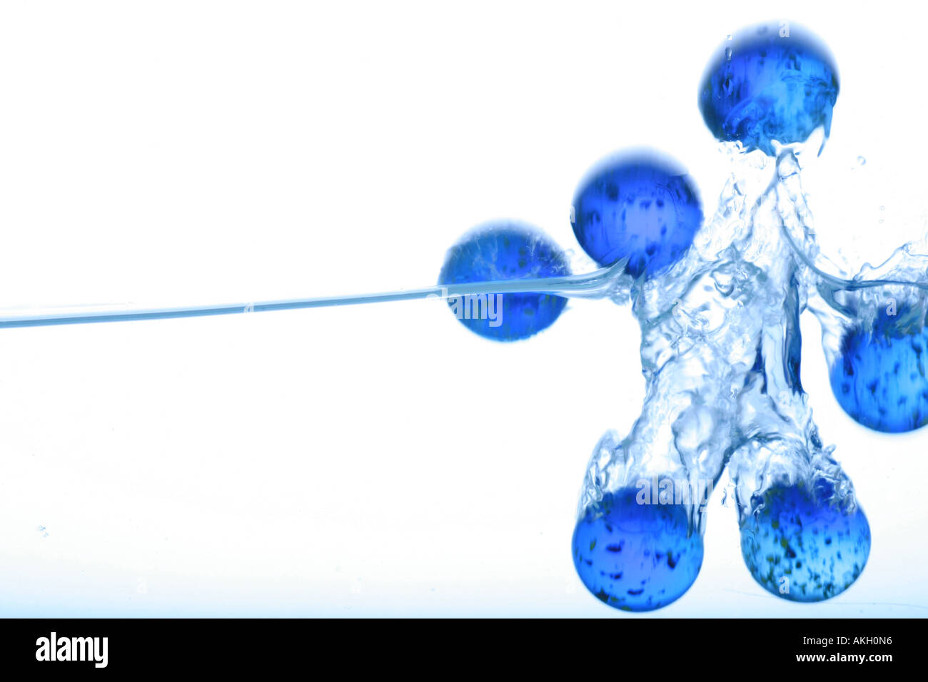 marbles falling in water water splash Stock Photo - Alamy