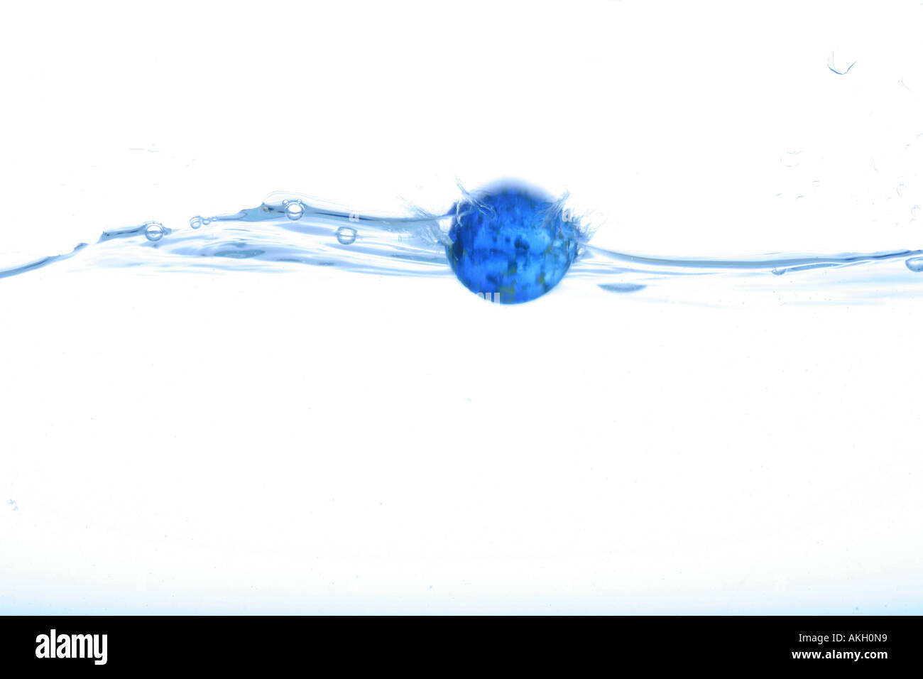 marbles falling in water water splash Stock Photo - Alamy