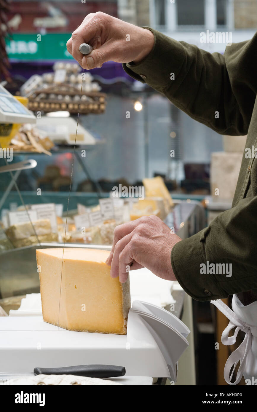 Cutting cheesemonger hi-res stock photography and images - Alamy