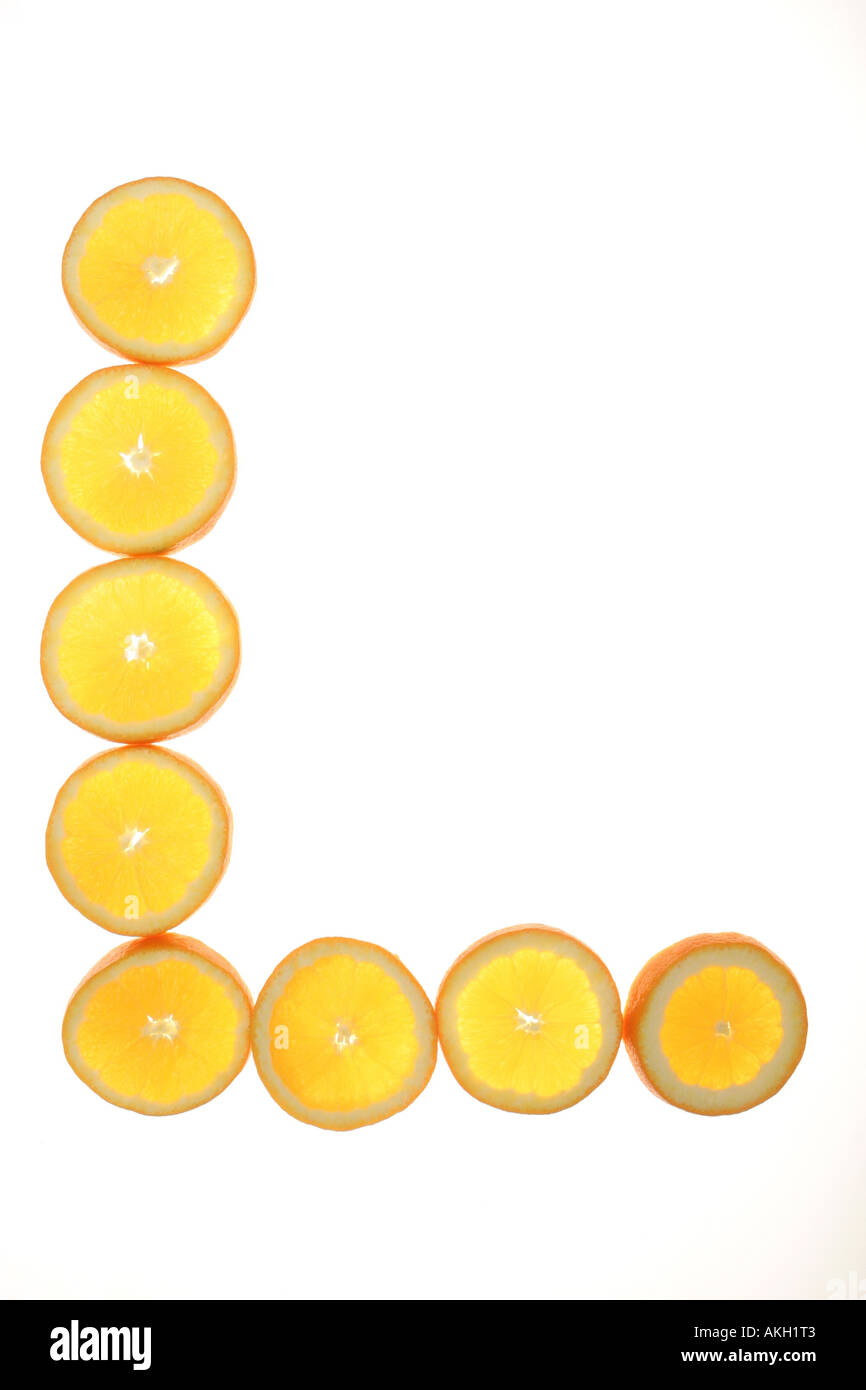 citrus fruits in slices forming an angle backlit Stock Photo - Alamy