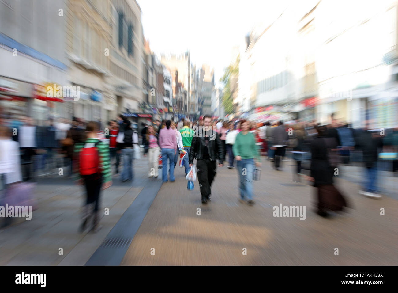 shoppers in a busy town centre high street Stock Photo - Alamy