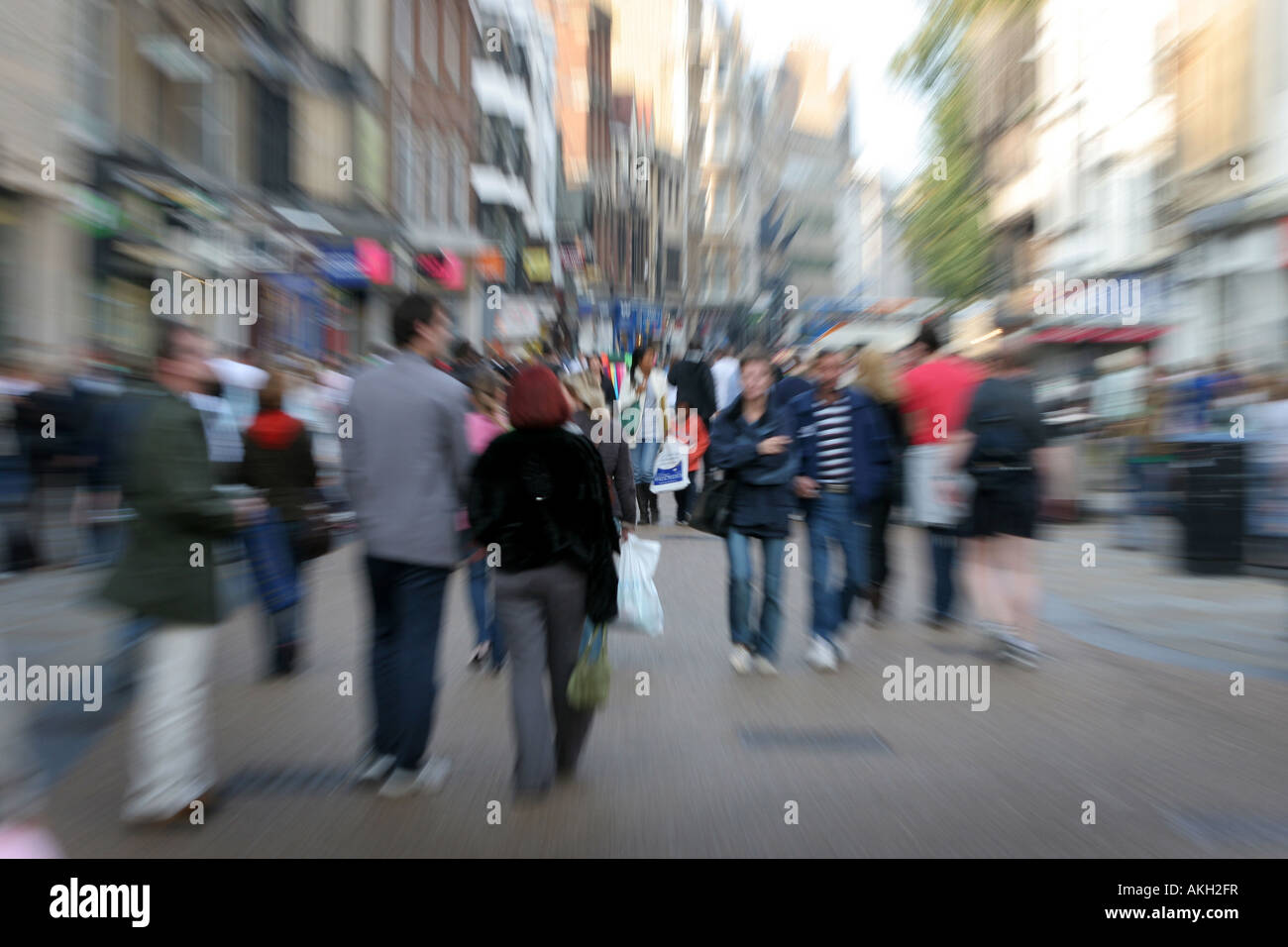 shoppers in a busy town centre high street Stock Photo - Alamy