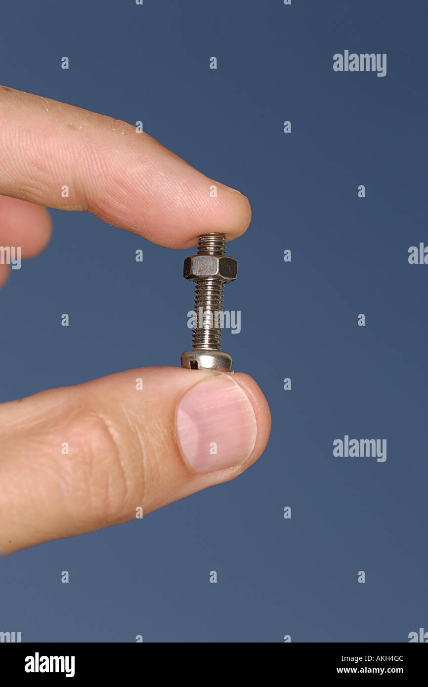 screw in hand Stock Photo - Alamy