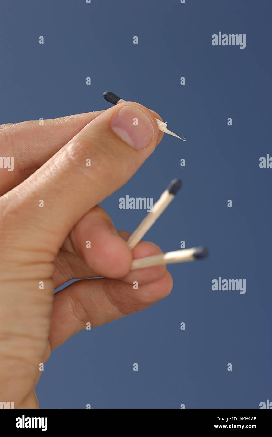 Hand holding matches Stock Photo - Alamy