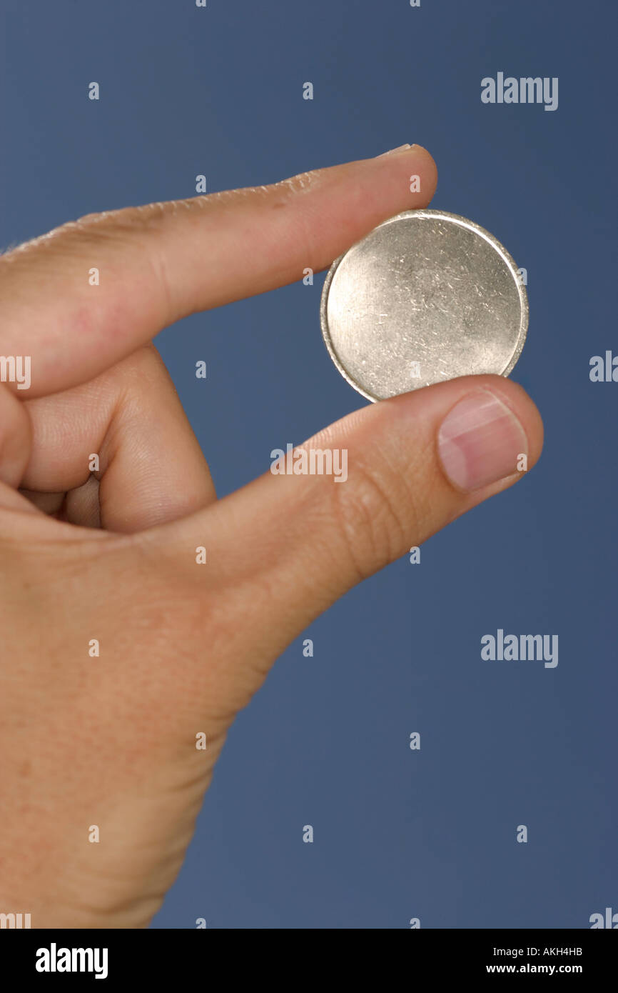 blank coin in hand Stock Photo - Alamy