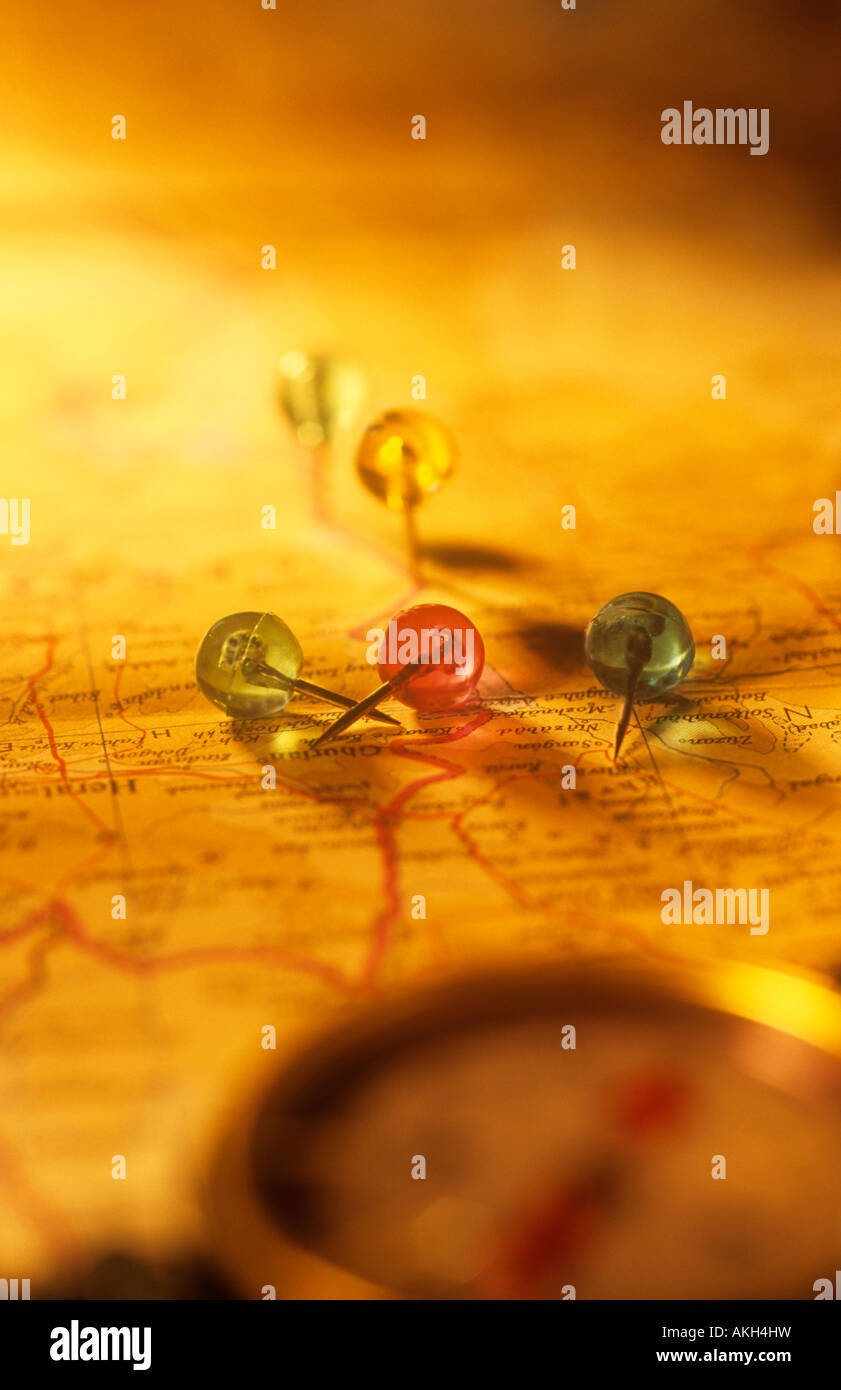 Map pins on map with a compass Stock Photo - Alamy