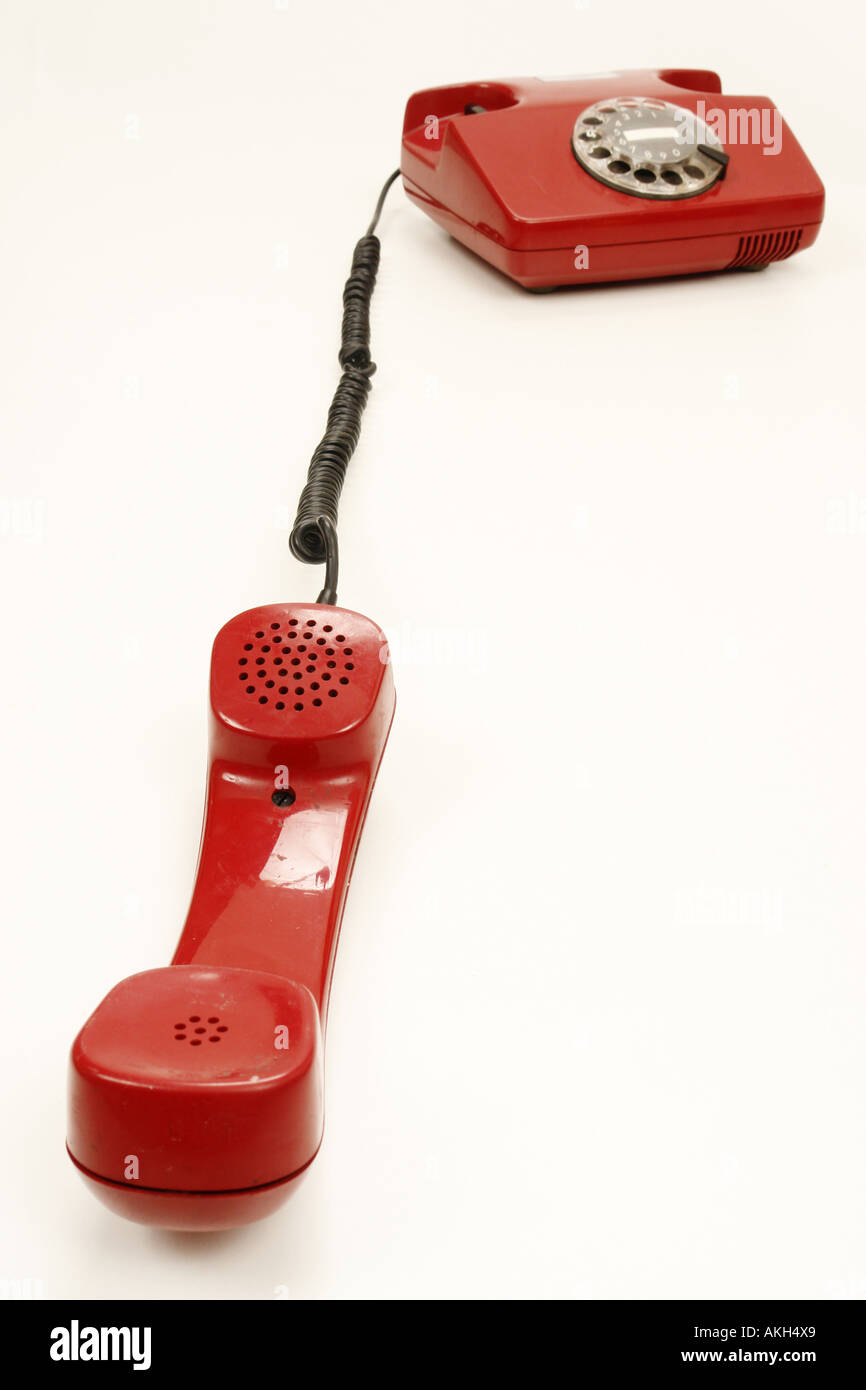 a red retro phone on white Stock Photo - Alamy
