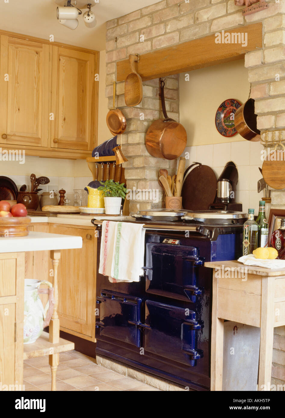 Blue Aga oven in cottage kitchen Stock Photo - Alamy