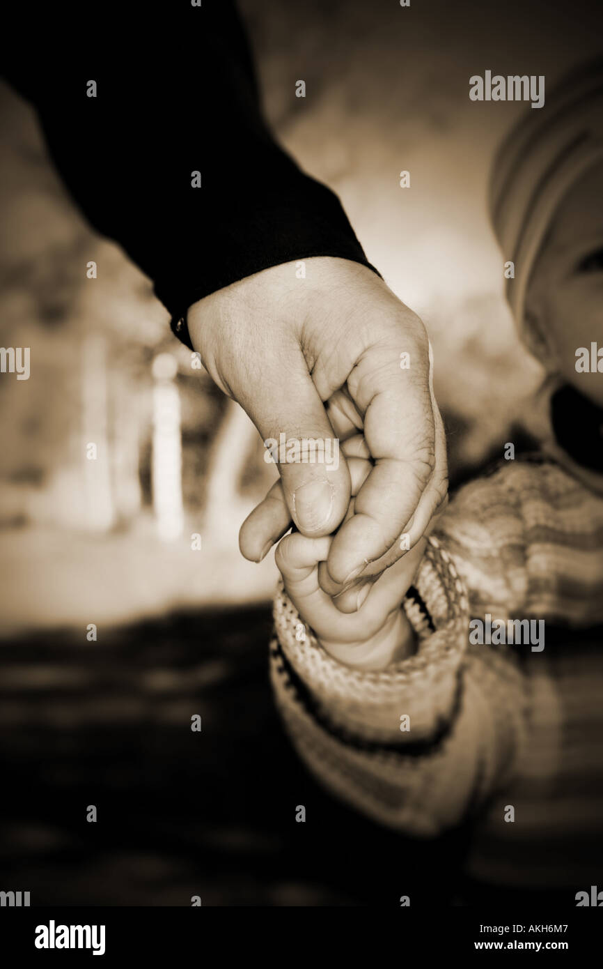 Guidance through the world Holding hand of a child to guide it Stock ...