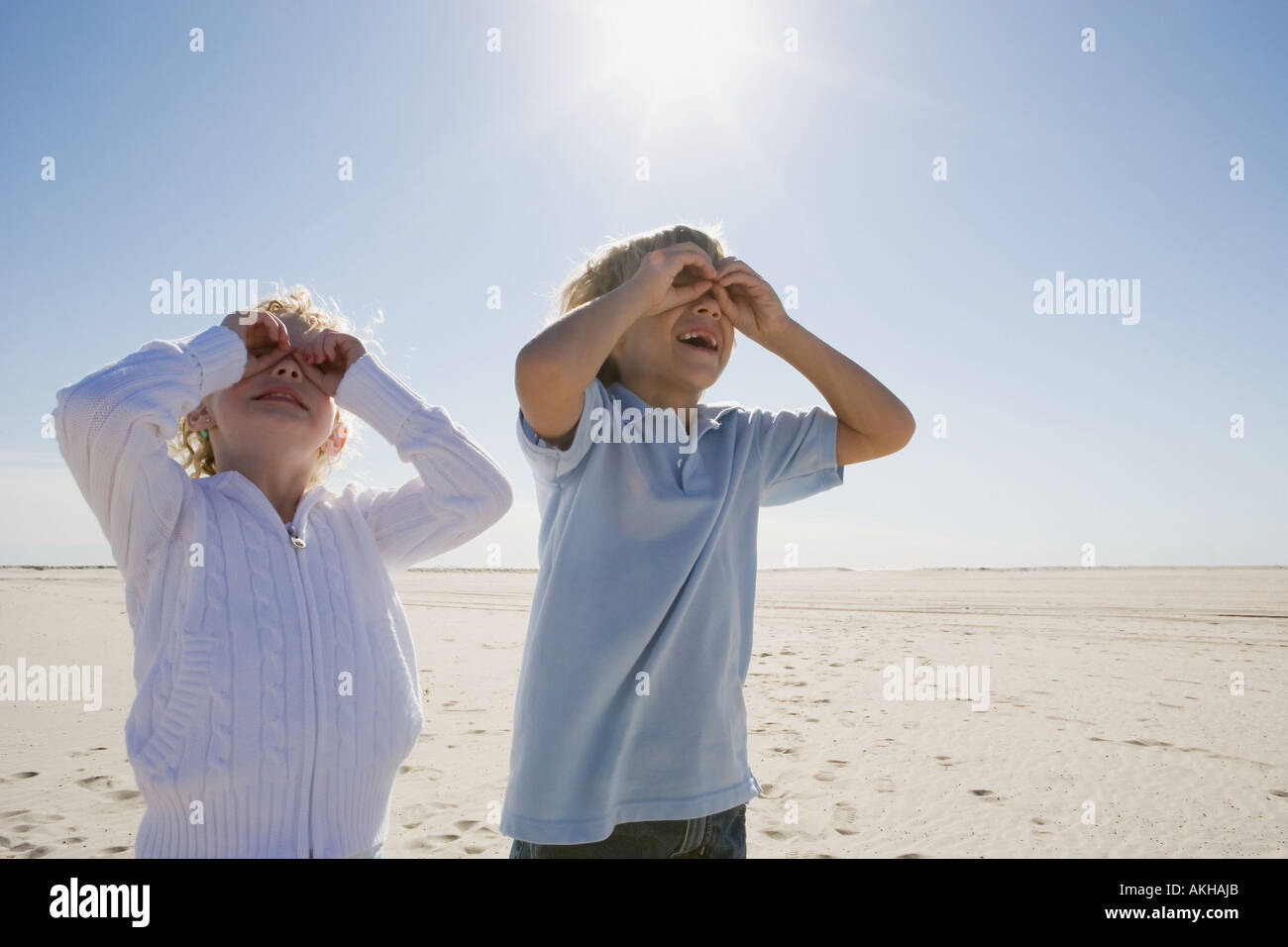Child hands through sand hi-res stock photography and images - Alamy