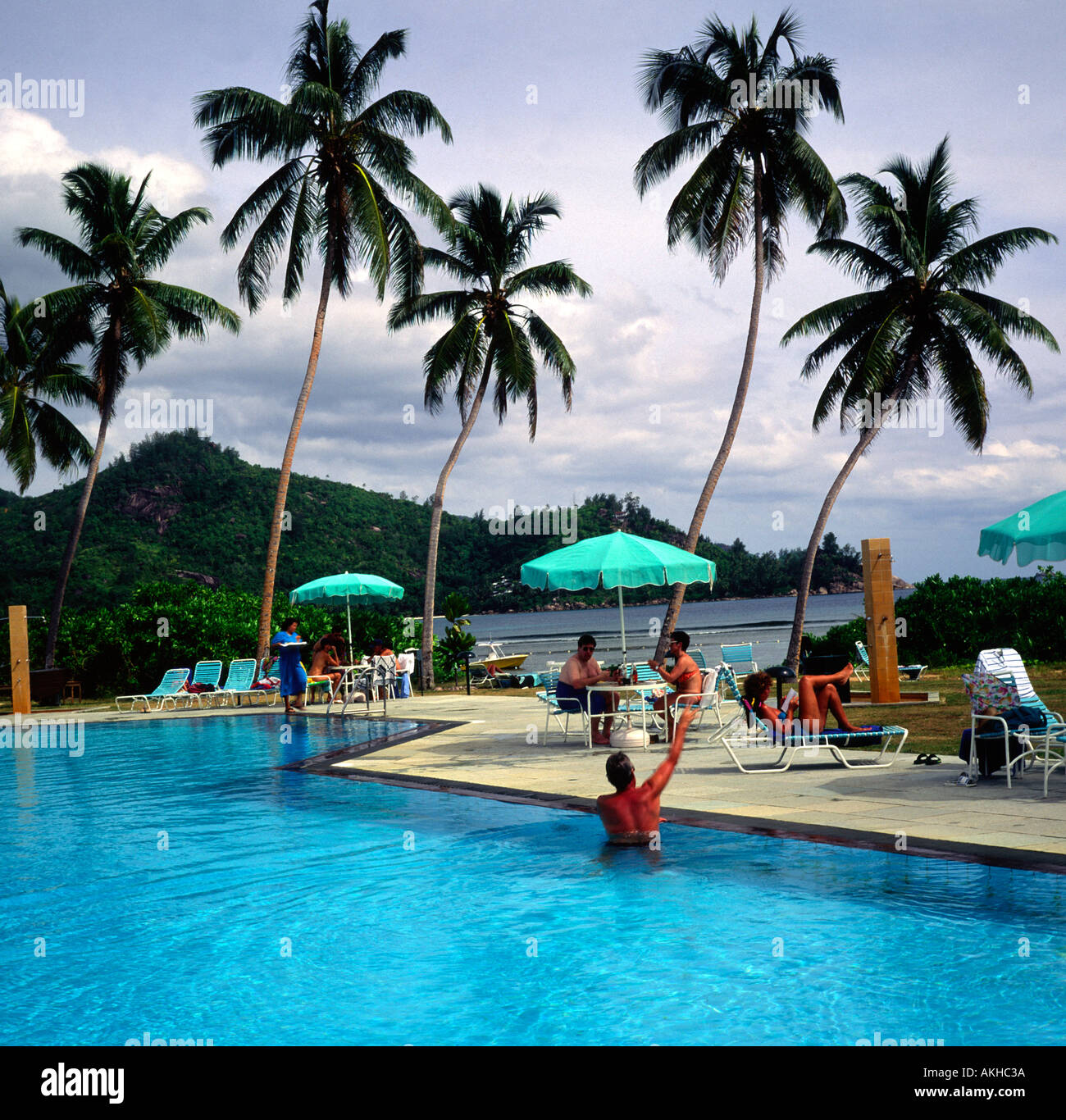 Palm trees swimming pool Plantation Club Mahe Seychelles Stock Photo ...