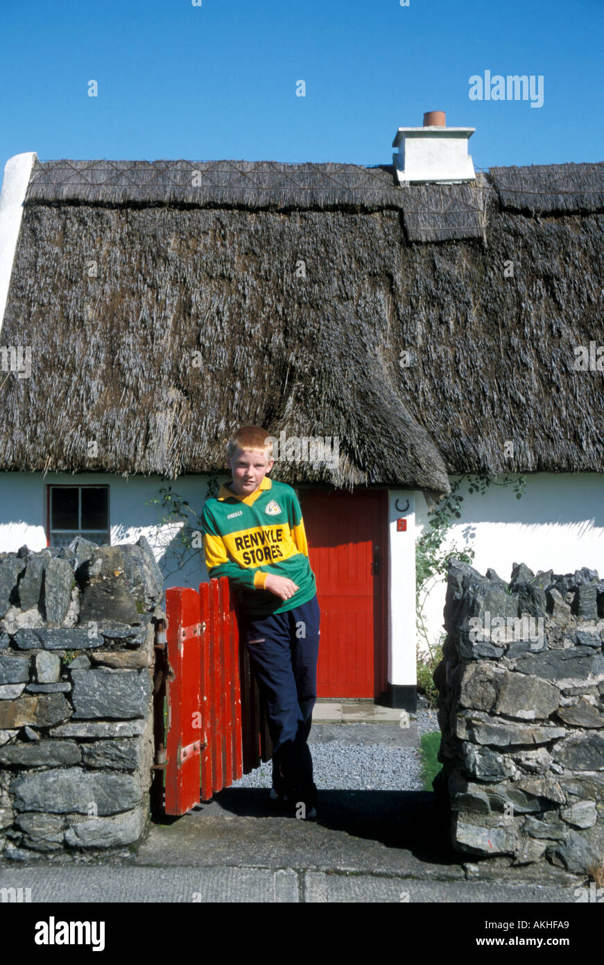 Europe Ireland Galway Connemara Tullycross Thatched roof cottage red ...