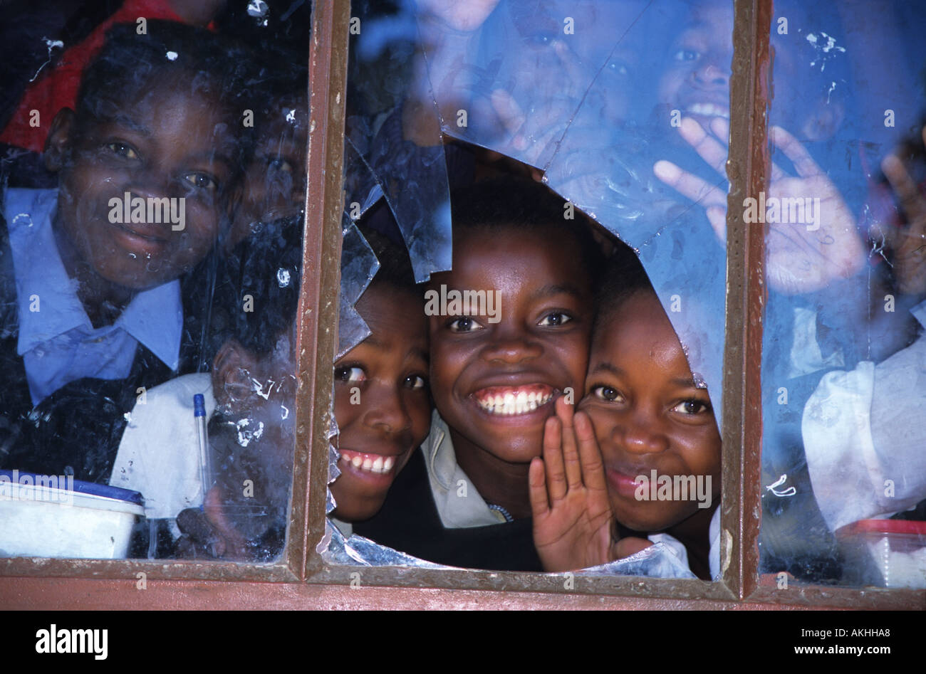 Children waving classroom hi-res stock photography and images - Alamy