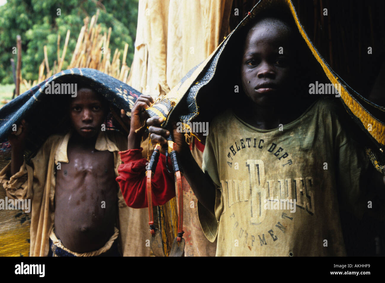 African children sheltering from the rain, near Tahoua, Niger, West ...