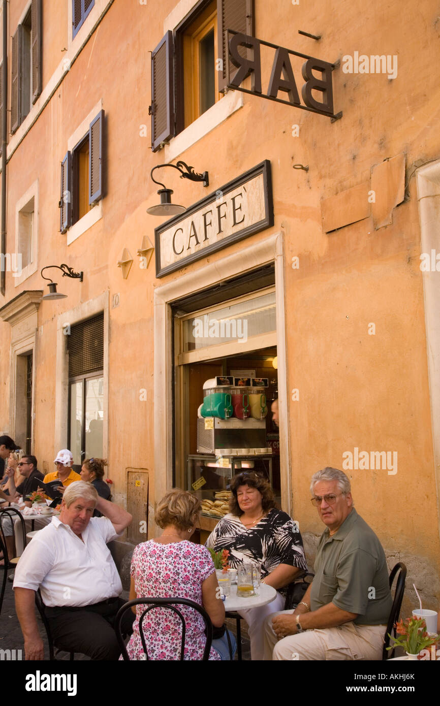 People sitting outside a cafe in Rome Italy Stock Photo - Alamy