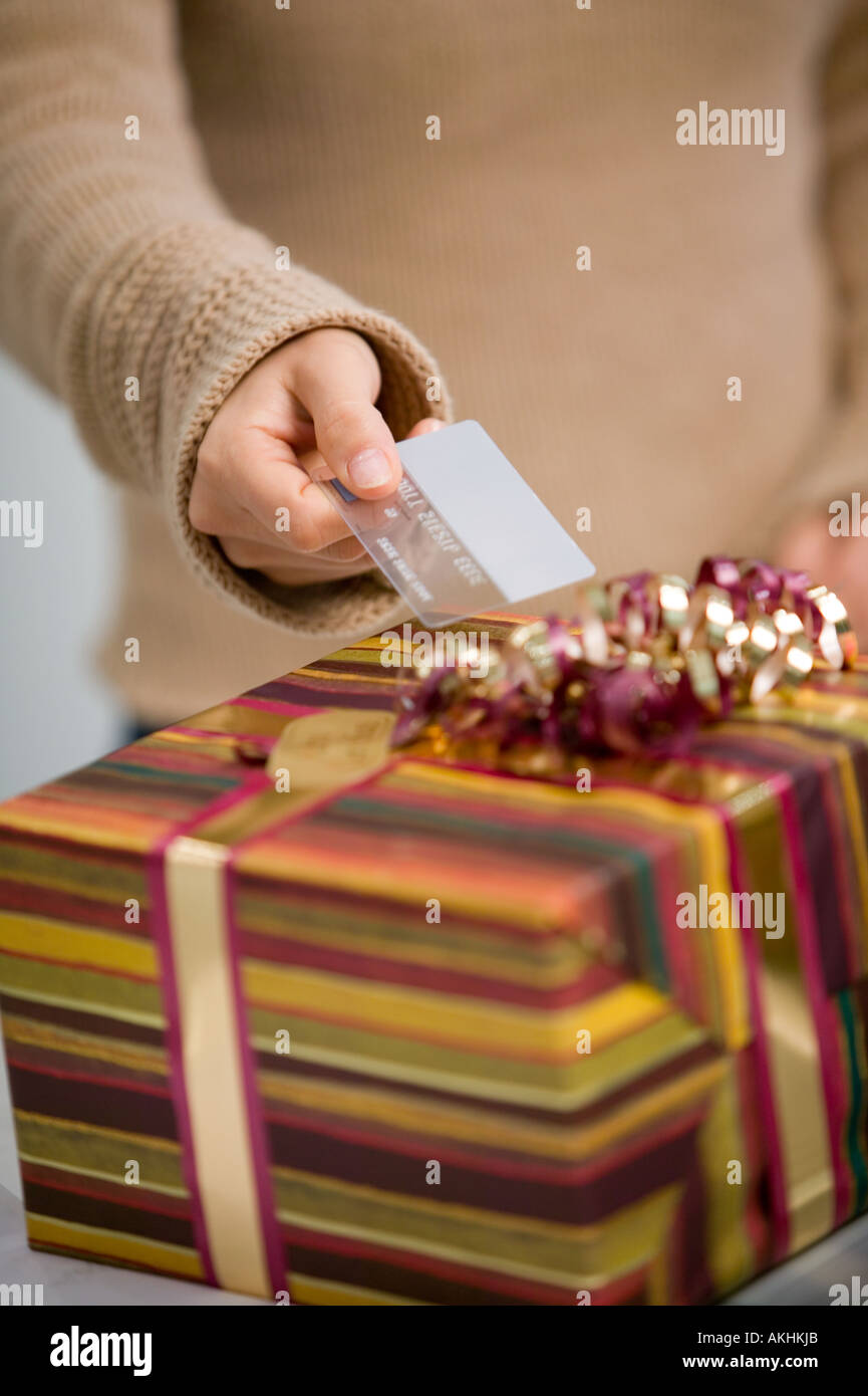Paying for gift with credit card Stock Photo - Alamy
