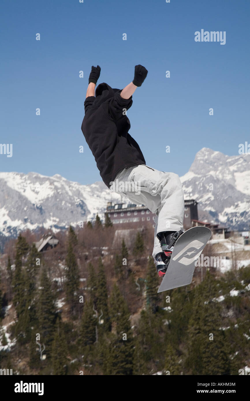 Snowboard jumping on Vogel mountain Bohinj Triglav National Park ...
