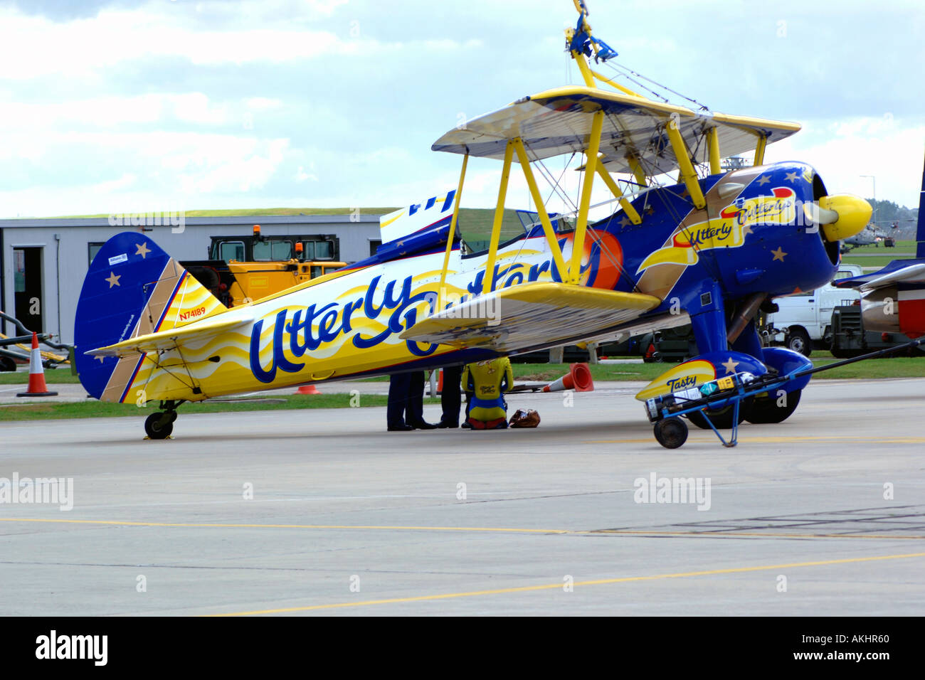 Wing walking on this 1930s bi- plane called Utterly Butterly Stock ...