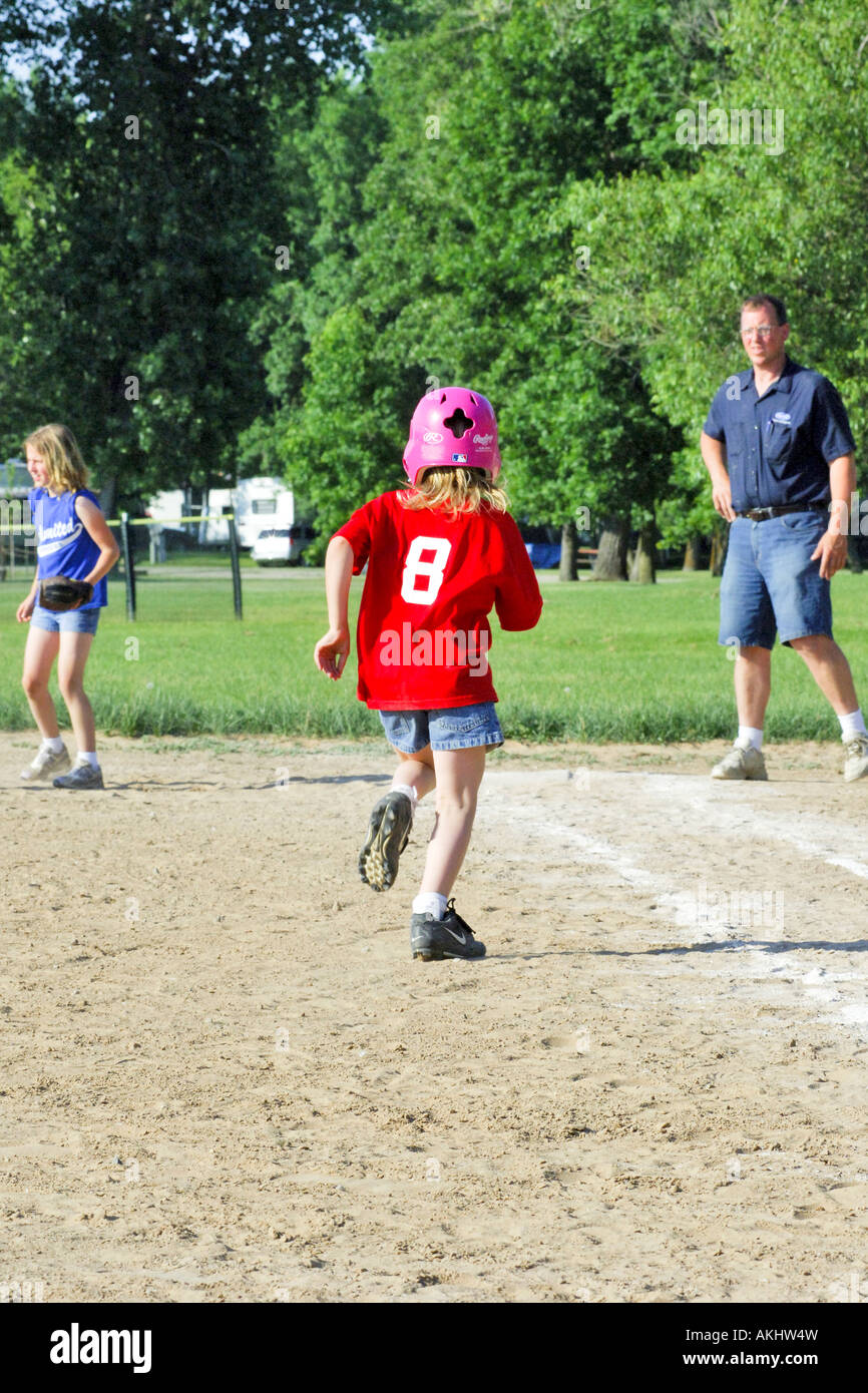 2nd grade school childrens after-school softball practice game Stock ...