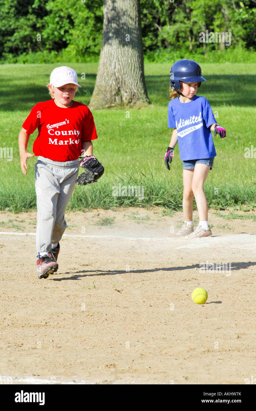 2nd grade school childrens softball practice Stock Photo - Alamy