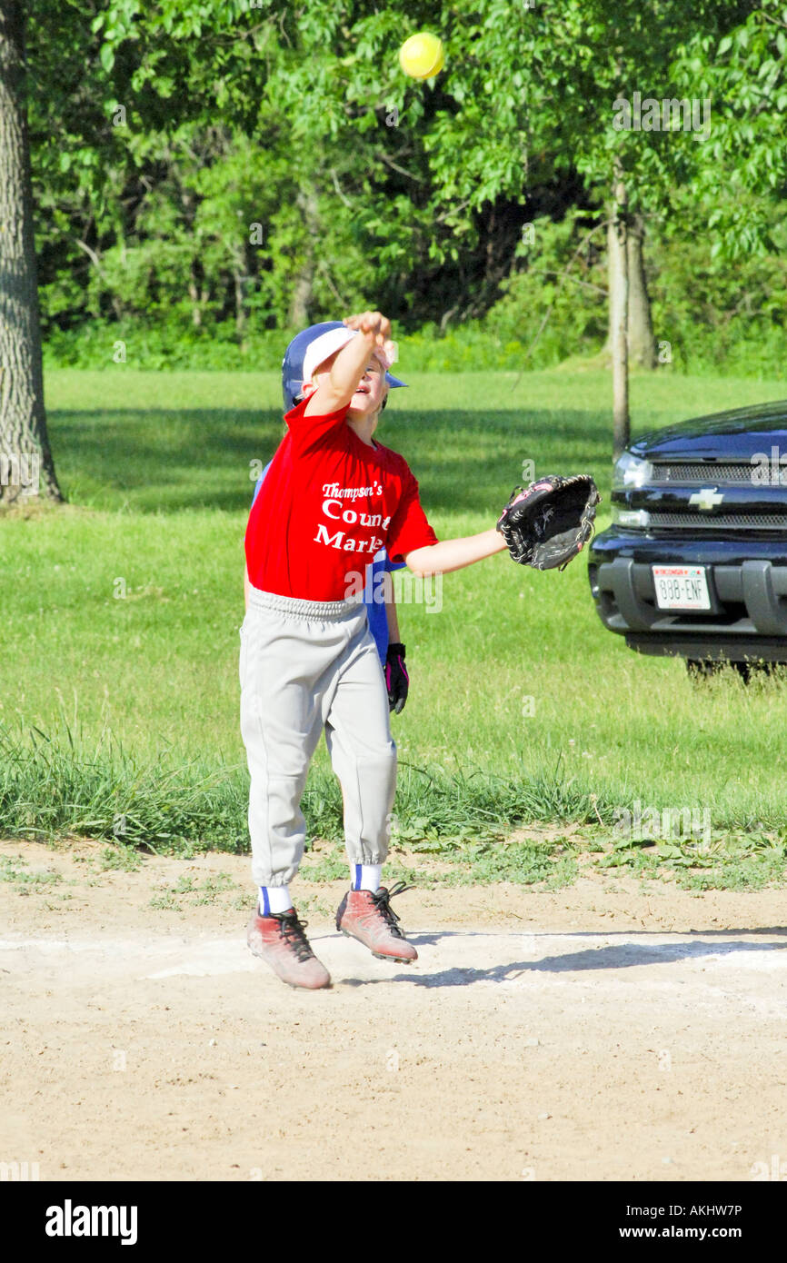 2nd grade school childrens softball practice Stock Photo - Alamy
