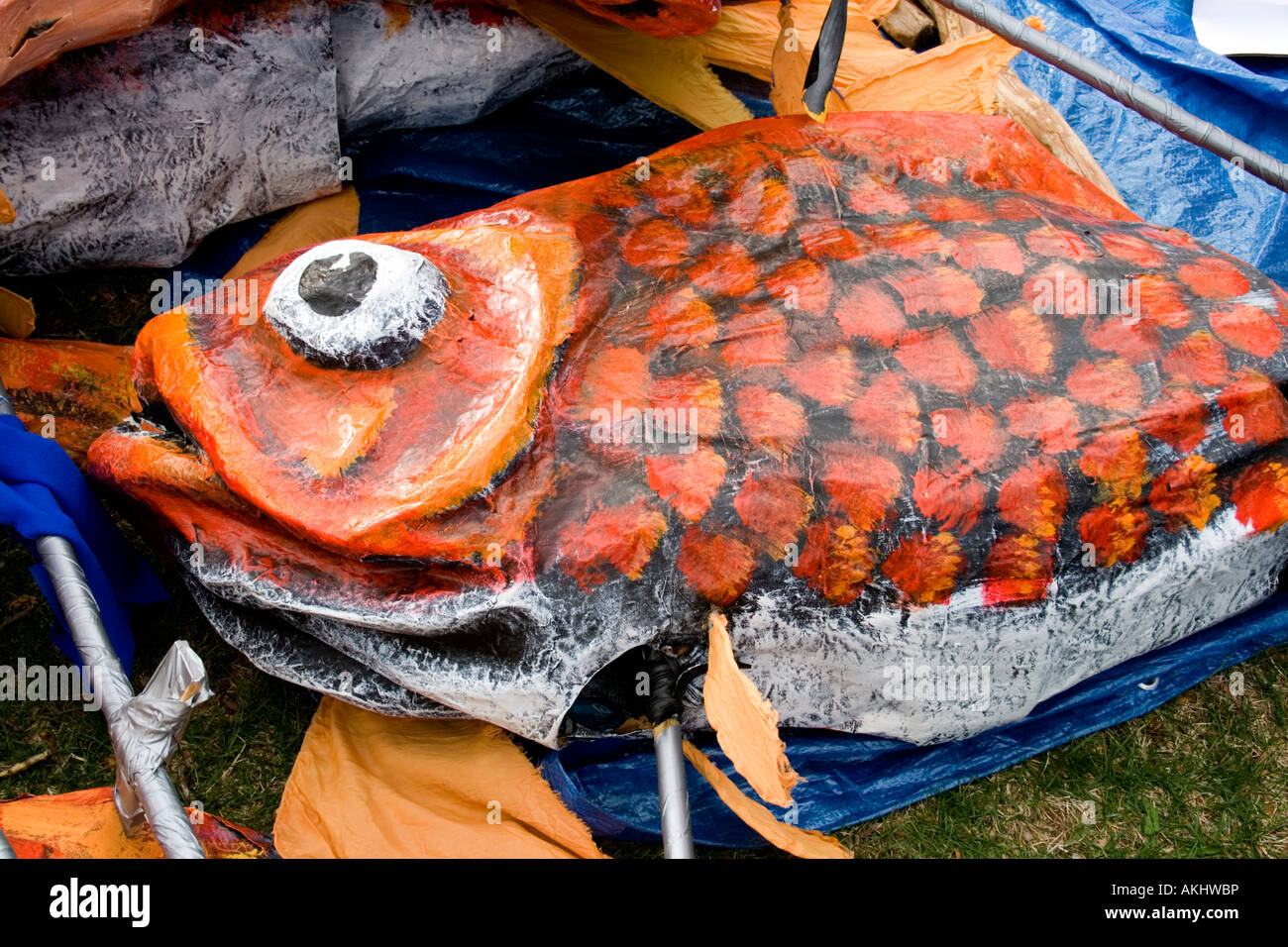 Large fish puppets in pile after performance. MayDay Parade and ...