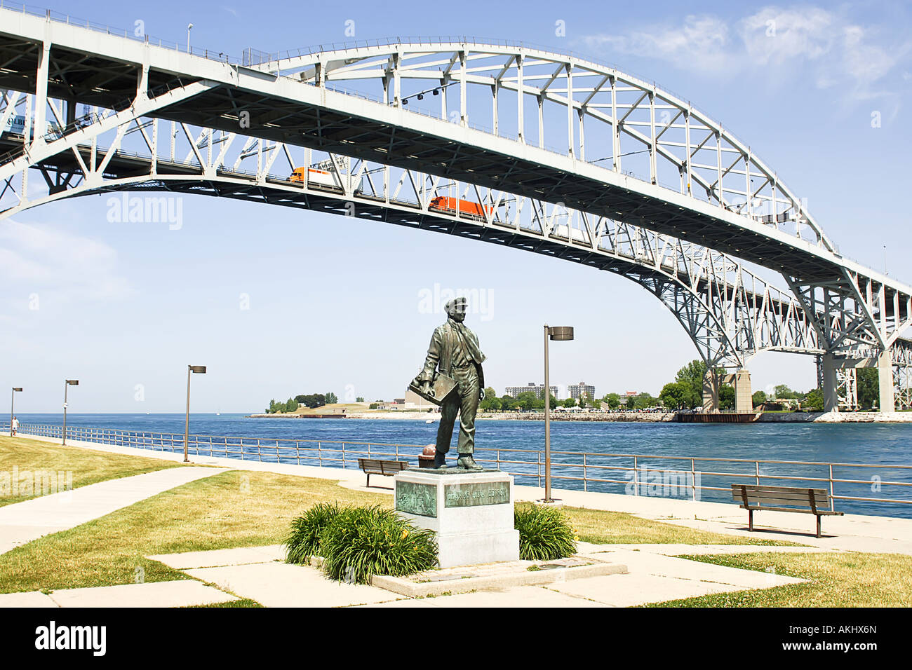 Statue of Thomas Edison stands below the Blue Water Bridge in Port ...