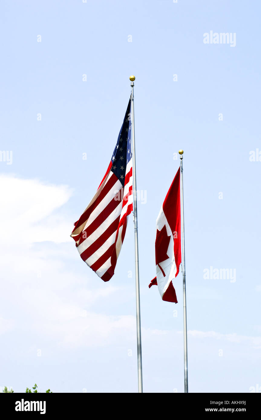 American and Canadian flags fly side by side Stock Photo - Alamy