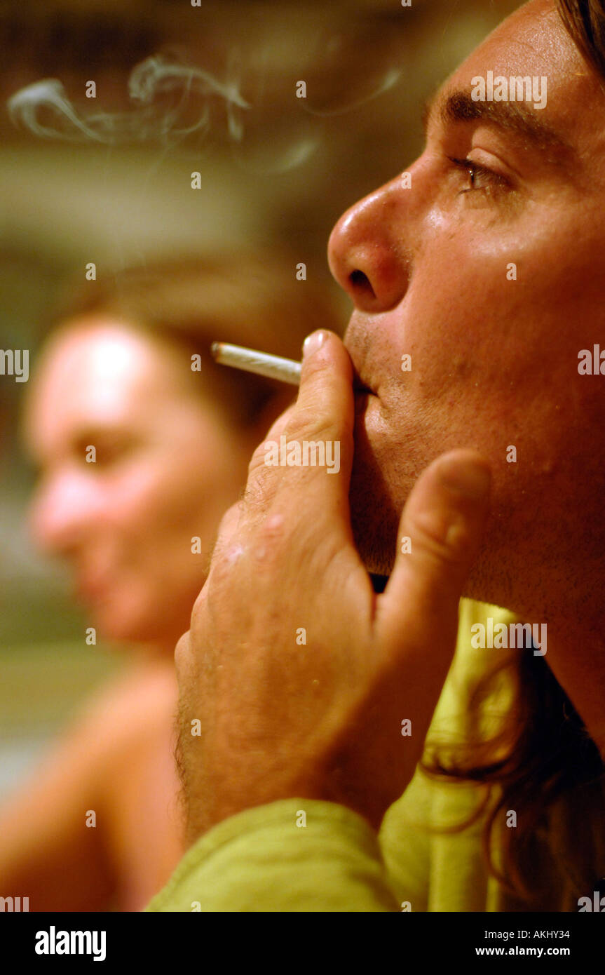 Lighting up for a smoke Stock Photo - Alamy