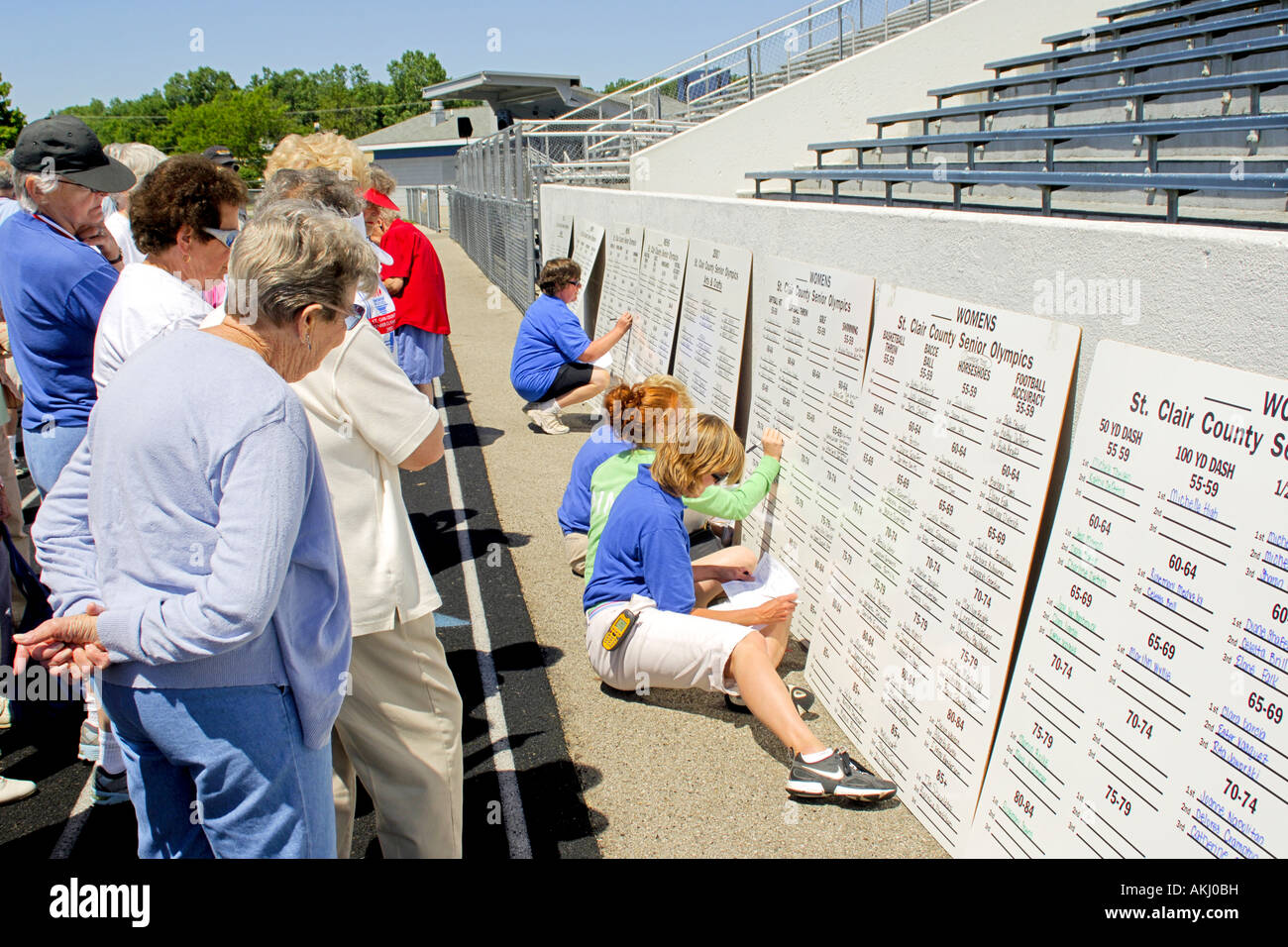 Senior people check the scoreboard at the Olympics Marysville Michigan ...