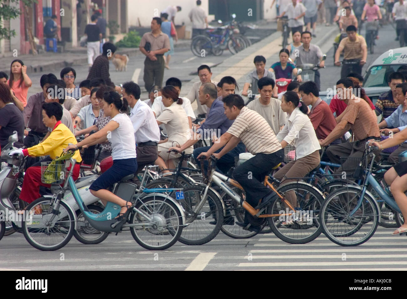 Bicycles are still a main form of transportation as seen here during ...