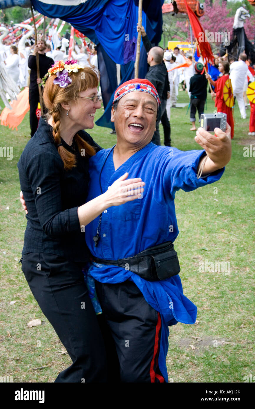 Self-portrait of [Asian American] and white woman age 50. MayDay Parade ...