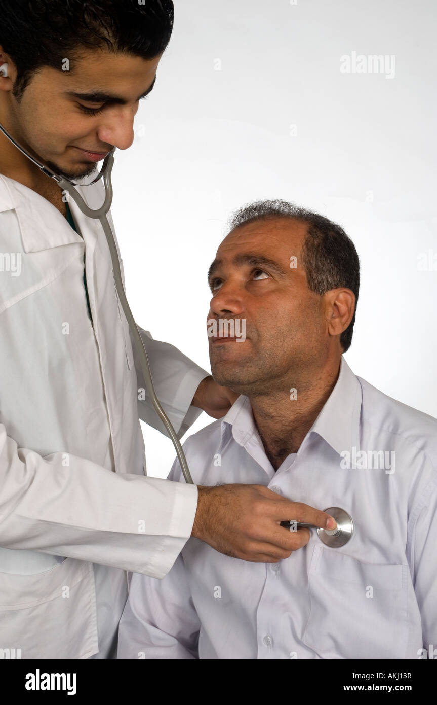 Doctor checking patient heartbeat Stock Photo - Alamy