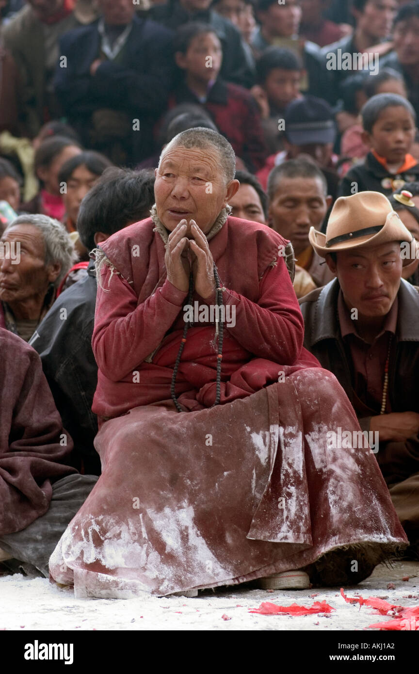 Devout nun at the Monlam Chenpo Padmasambhava birthday Katok Monastery ...