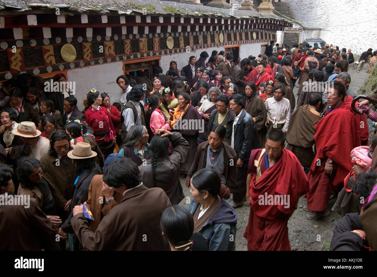 Crowd watches the dances at the Monlam Chenmo masked dances Katok ...