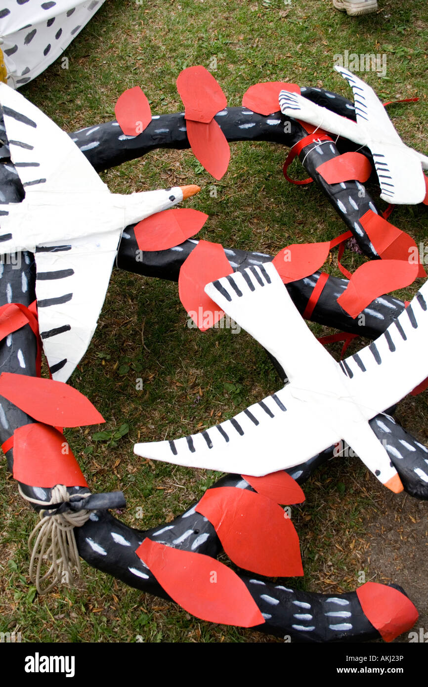 White birds on pageant symbol for recreation of spring. MayDay Parade ...