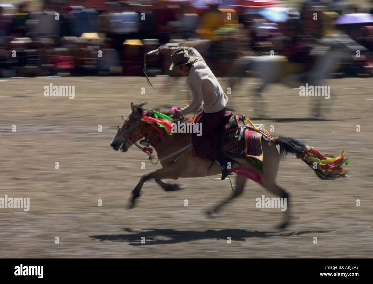 Horse race litang horse festival hi-res stock photography and images ...