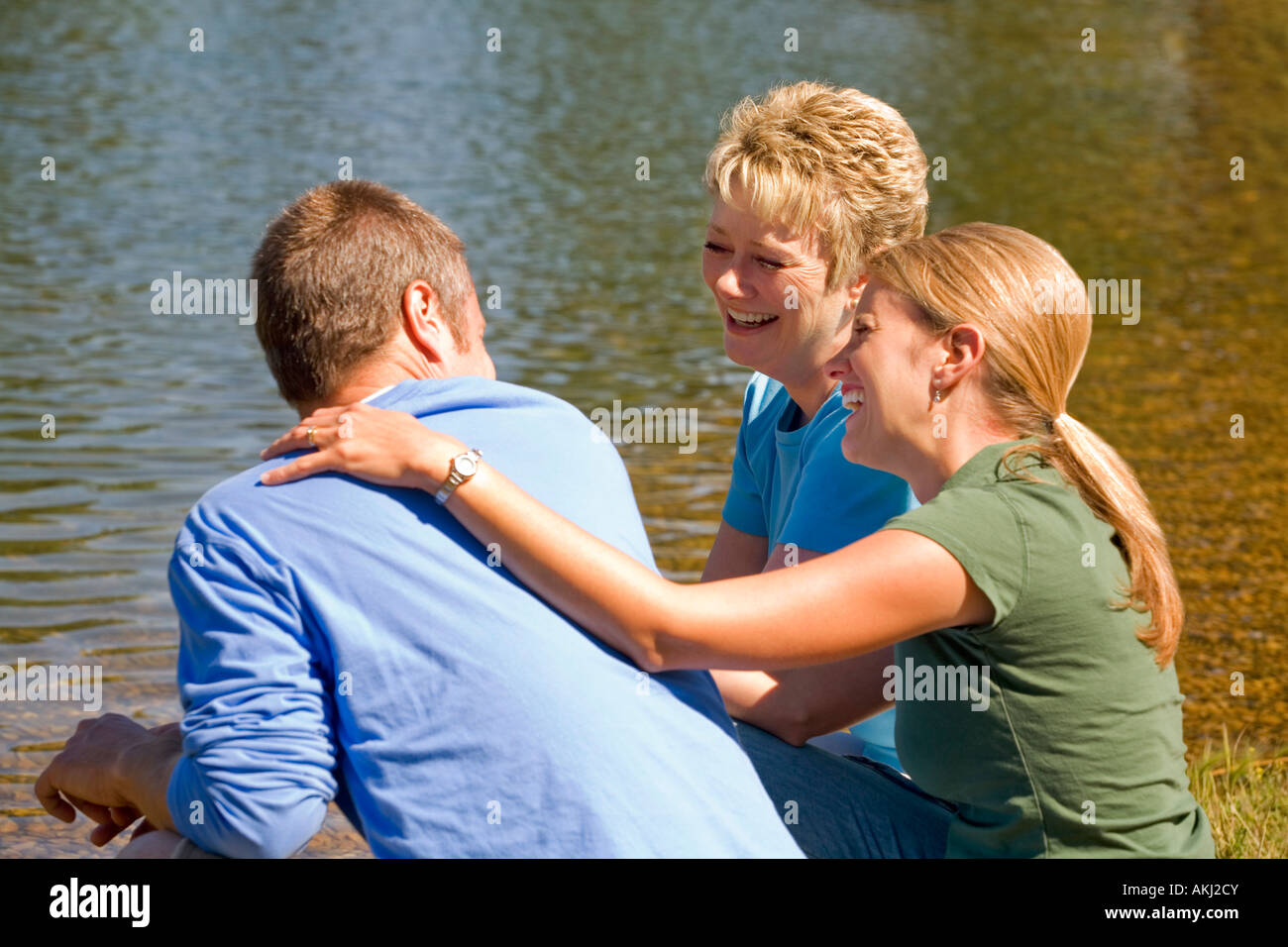 Side view of a happy family Stock Photo - Alamy